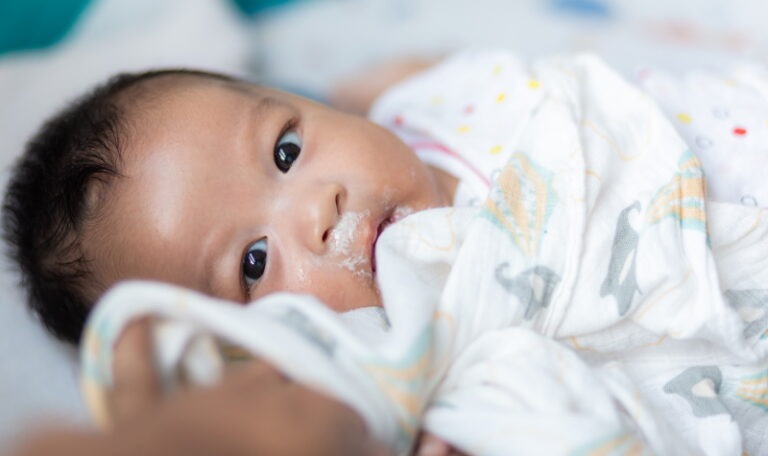Baby Spitting up Curdled Milk? 8 Causes You Need to Know
